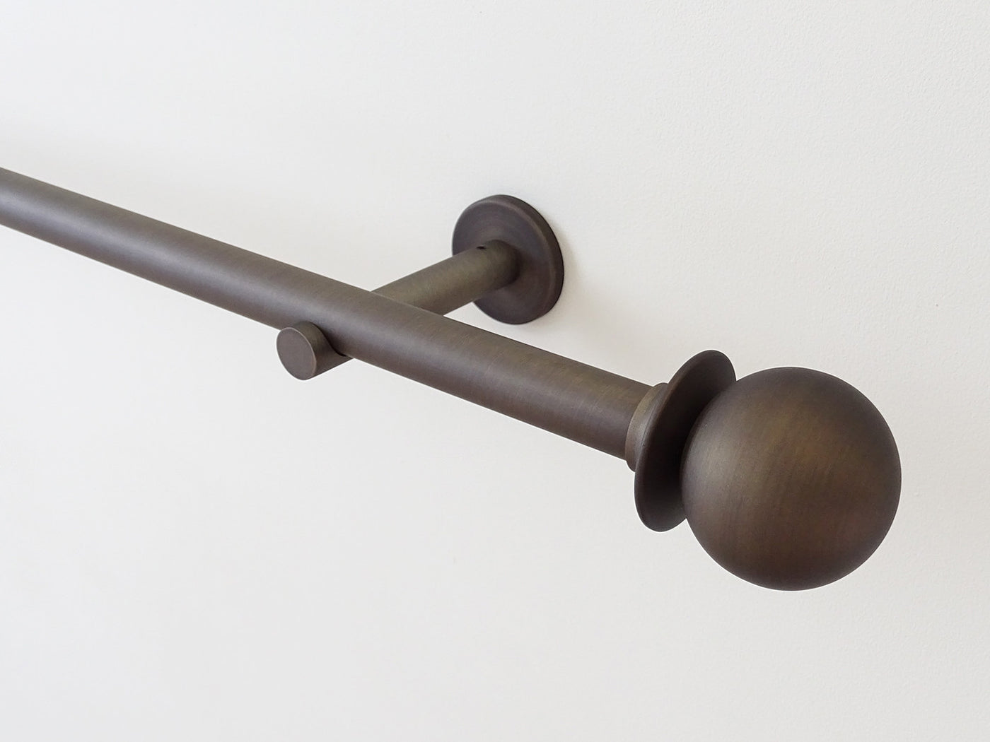 Walcot House | Brushed Bronze / antique brass metal curtain poles